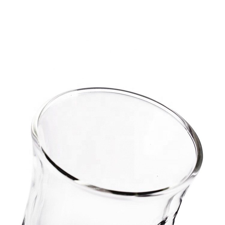 Stable glass mug with enlarged base